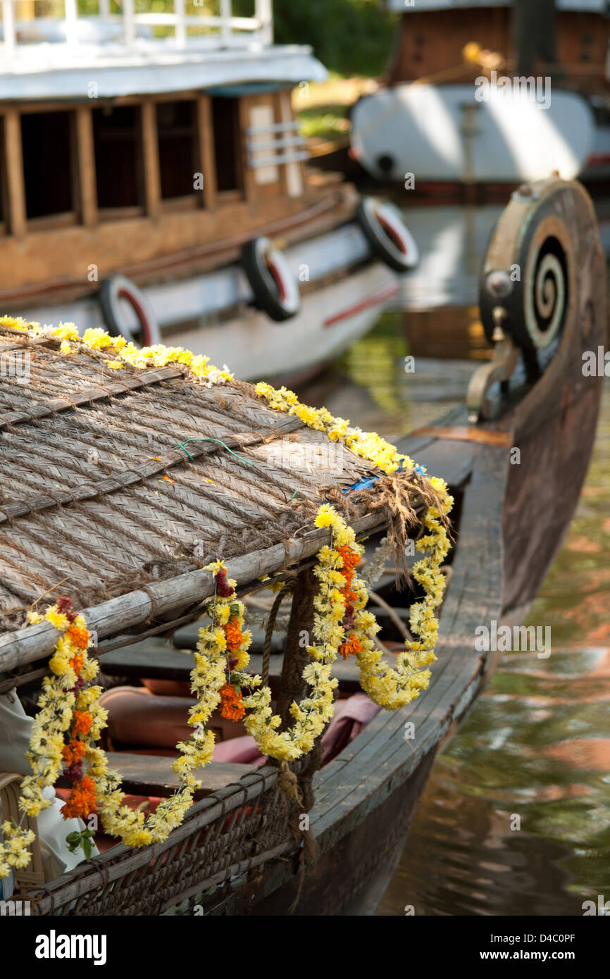 A Converted Rice Boat, decked out in flowers, acts as a Wedding Boat on ...