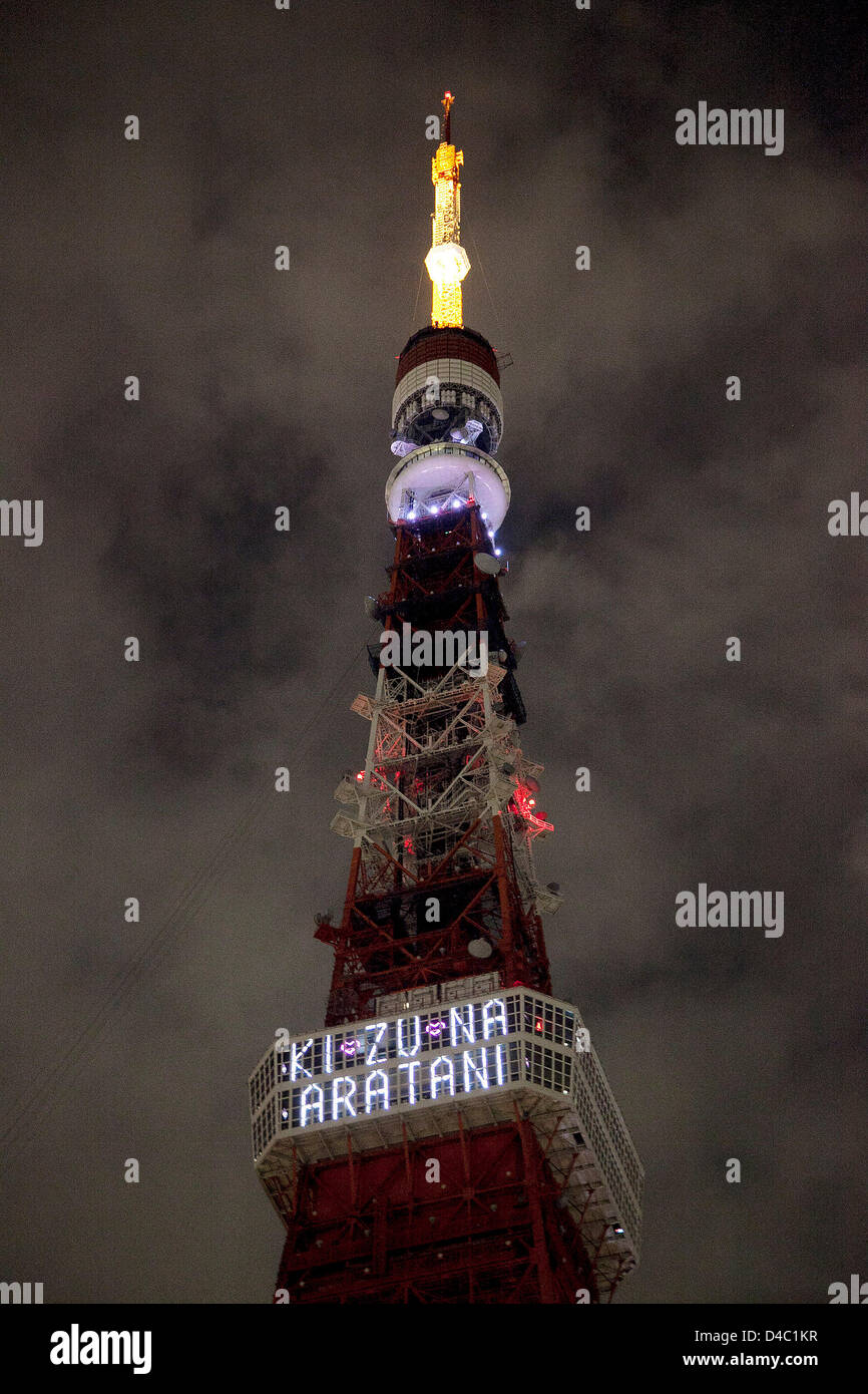 Tokyo, Japan. 11th March 2013. Tokyo Tower displays a message "Kizuna ...