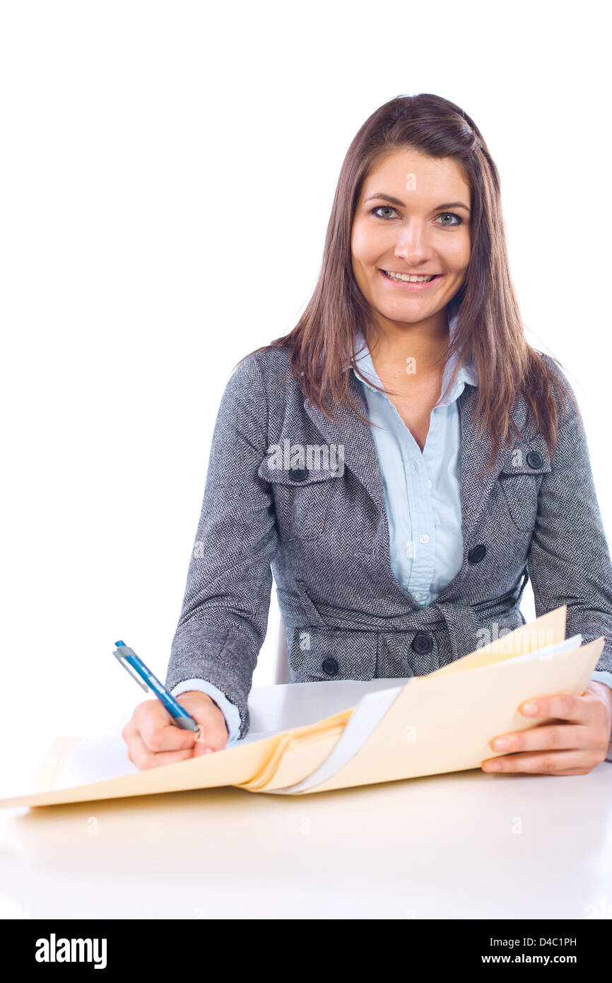 Business Woman Writing notes at desk isolated on white Stock Photo - Alamy