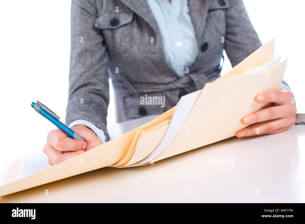 Business Woman Writing notes at desk isolated on white Stock Photo - Alamy