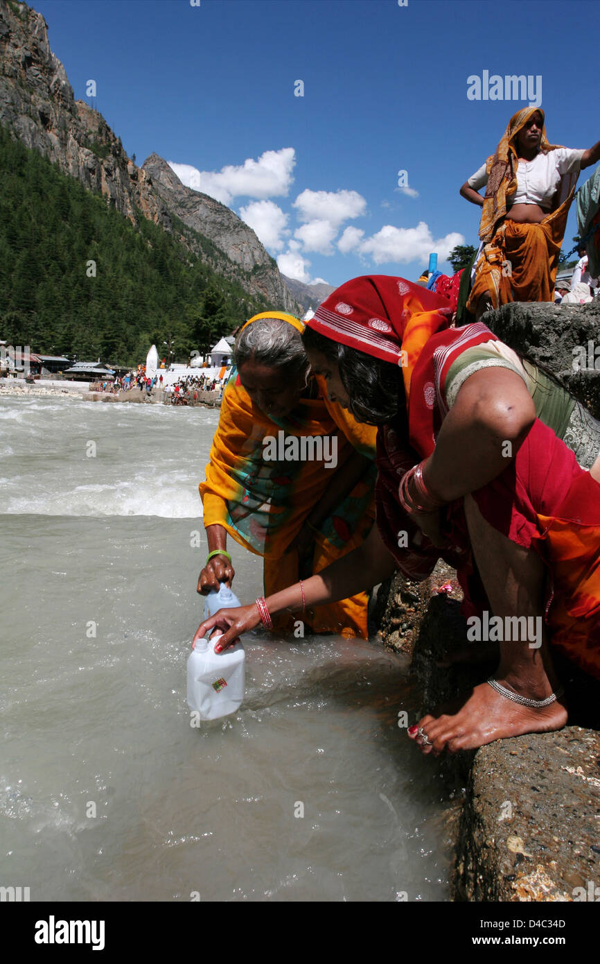 Pilgrims collect sacred Ganga water at Gangotri Stock Photo - Alamy