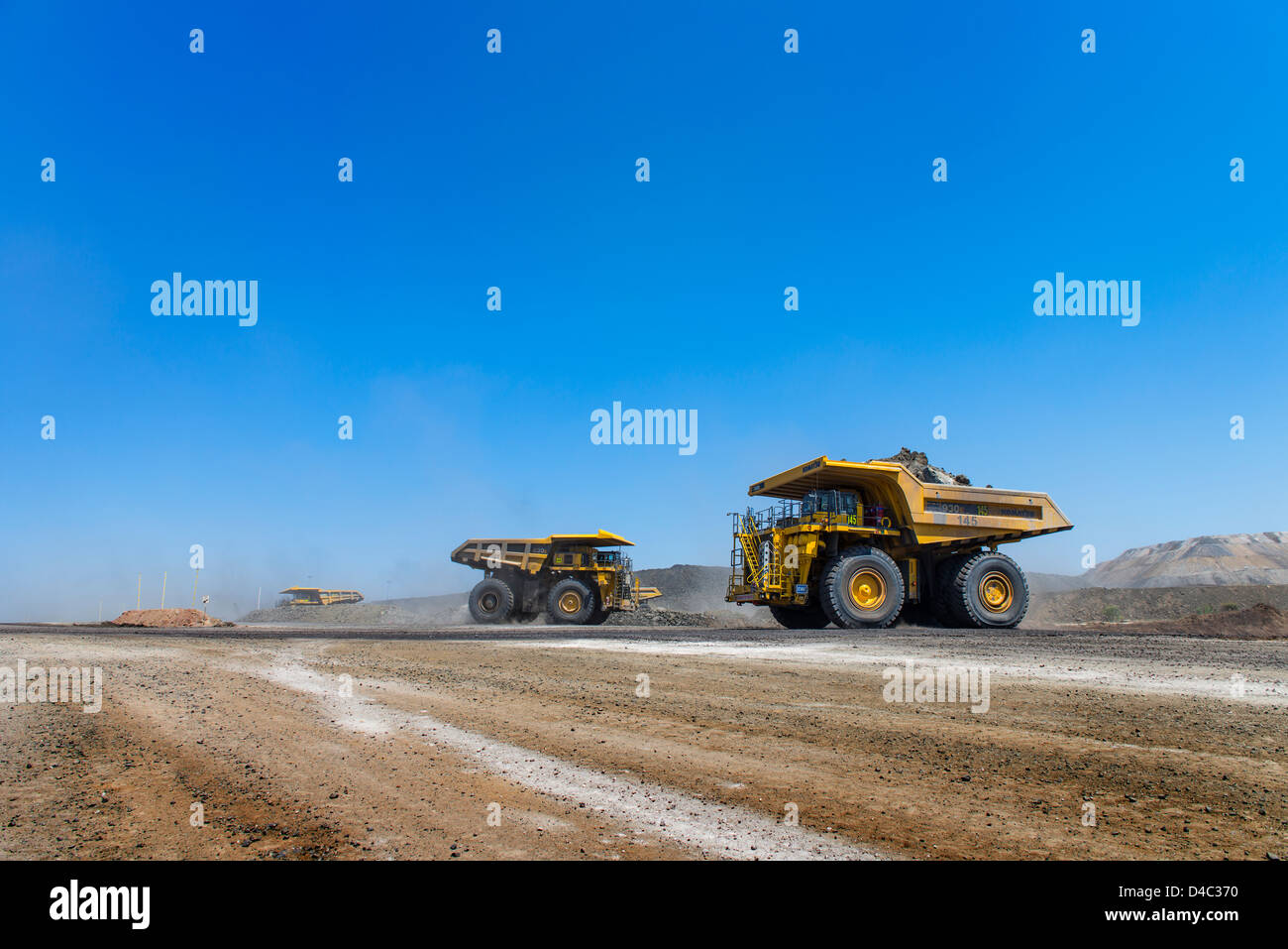 Mining truck trucks mine mines coal blue sky hi-res stock photography ...