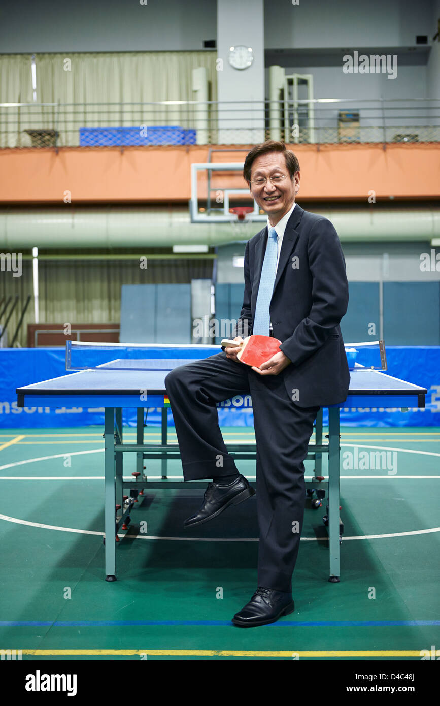 Jonney Shih, Chairman of ASUS poses on a ping pong table at the Asus ...