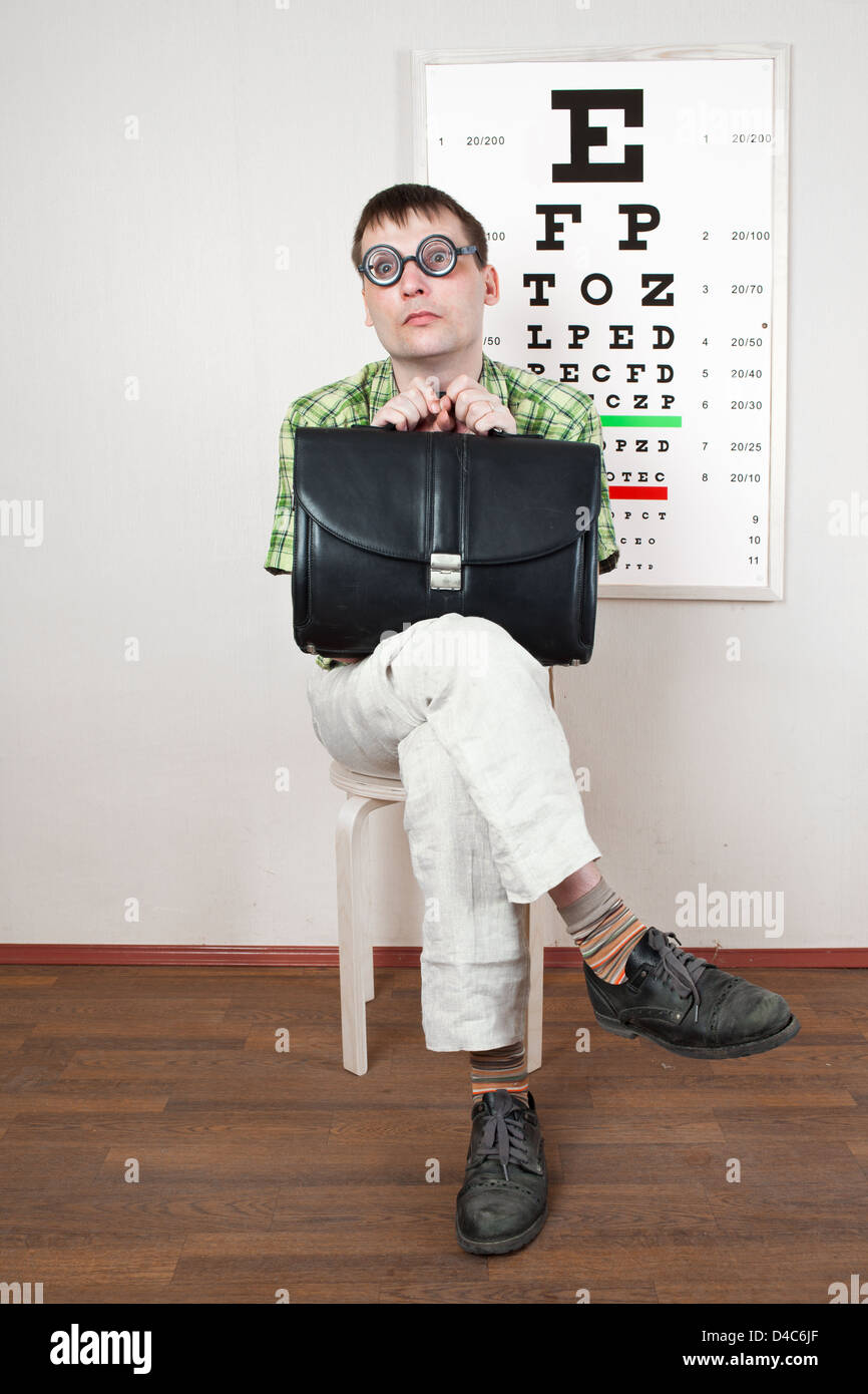 person wearing spectacles in an office at the doctor Stock Photo - Alamy