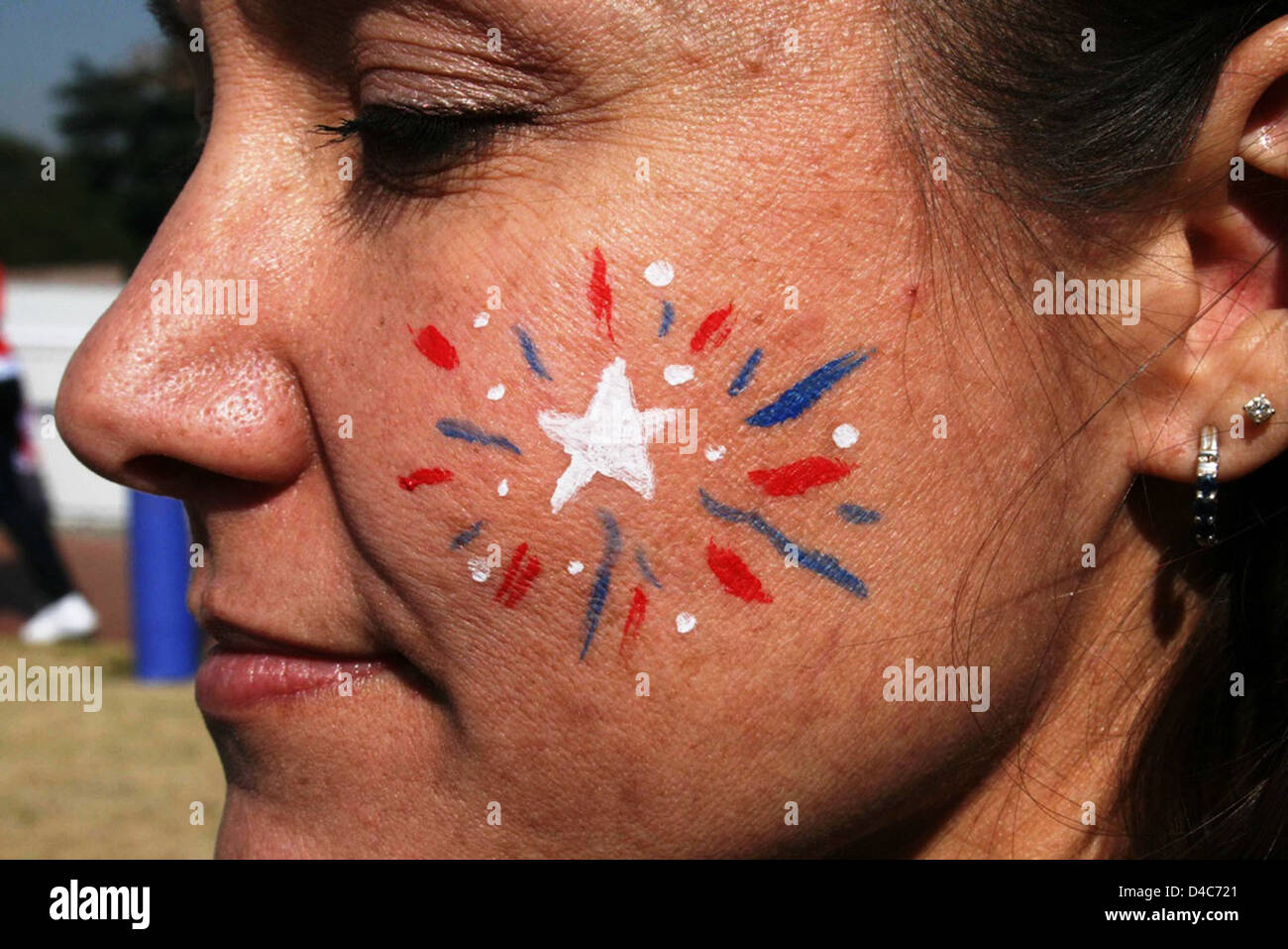 A Fan Shows Her Team Spirit With Face Paint Stock Photo - Alamy