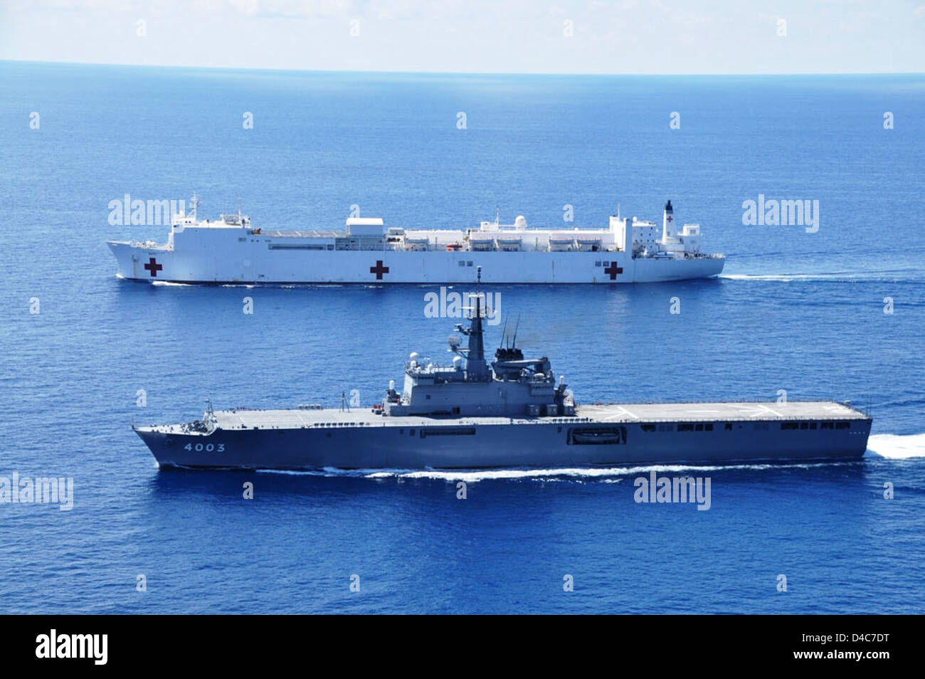 JDS Kunisaki and USNS MERCY Sail Stock Photo - Alamy