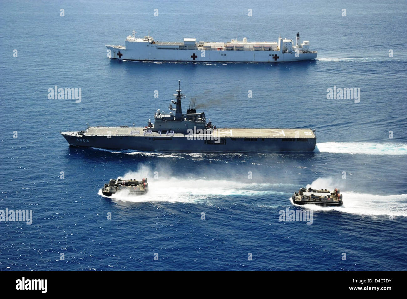JDS Kunisaki and USNS MERCY Sail Stock Photo - Alamy