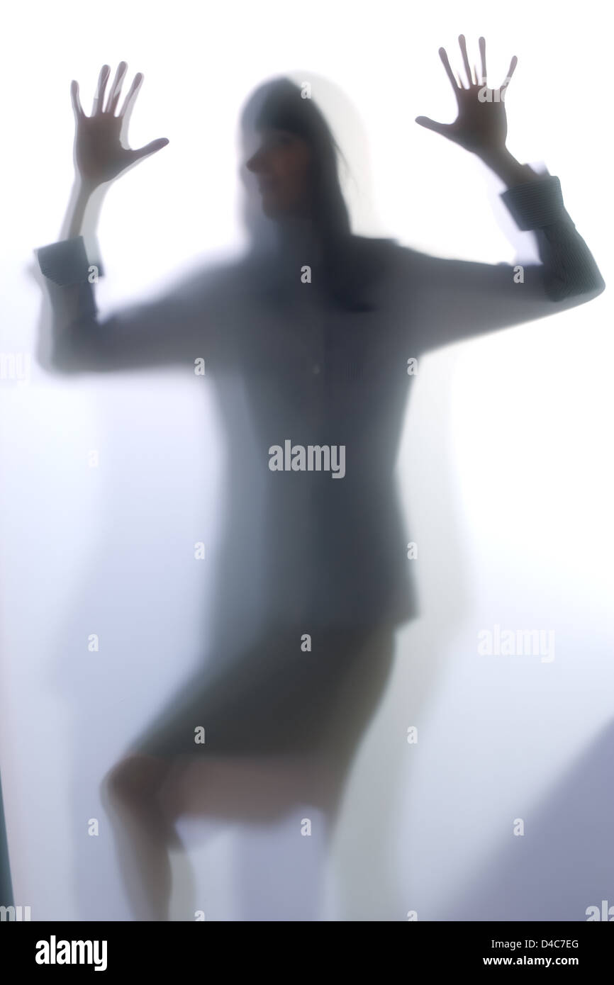 Diffused Silhouette of a womans body threw frosted glass Stock Photo ...