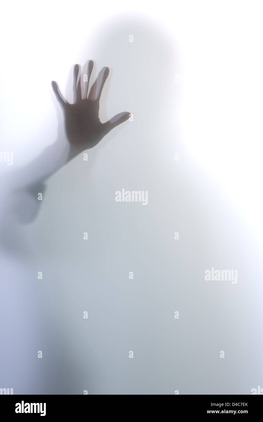 Diffused Silhouette of a womans body threw frosted glass Stock Photo ...