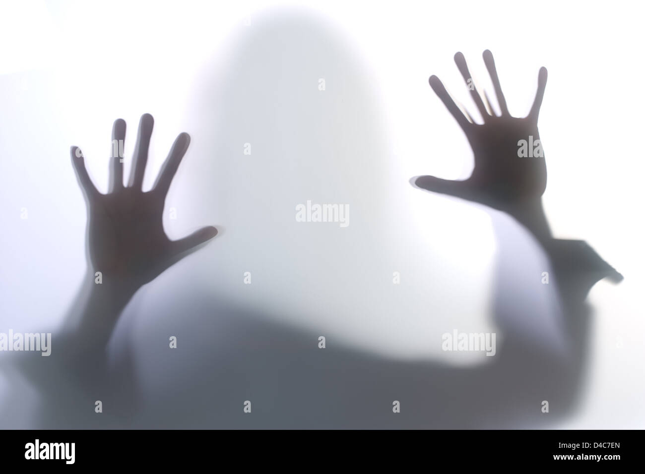 Diffused Silhouette of a womans body threw frosted glass Stock Photo ...