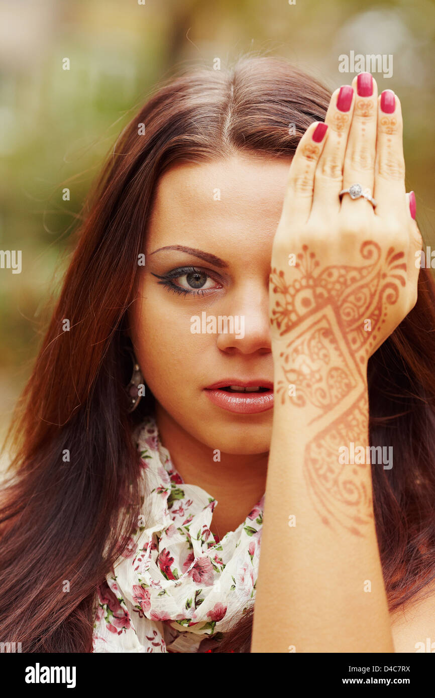 Beautiful girl painted Mehandi Stock Photo - Alamy