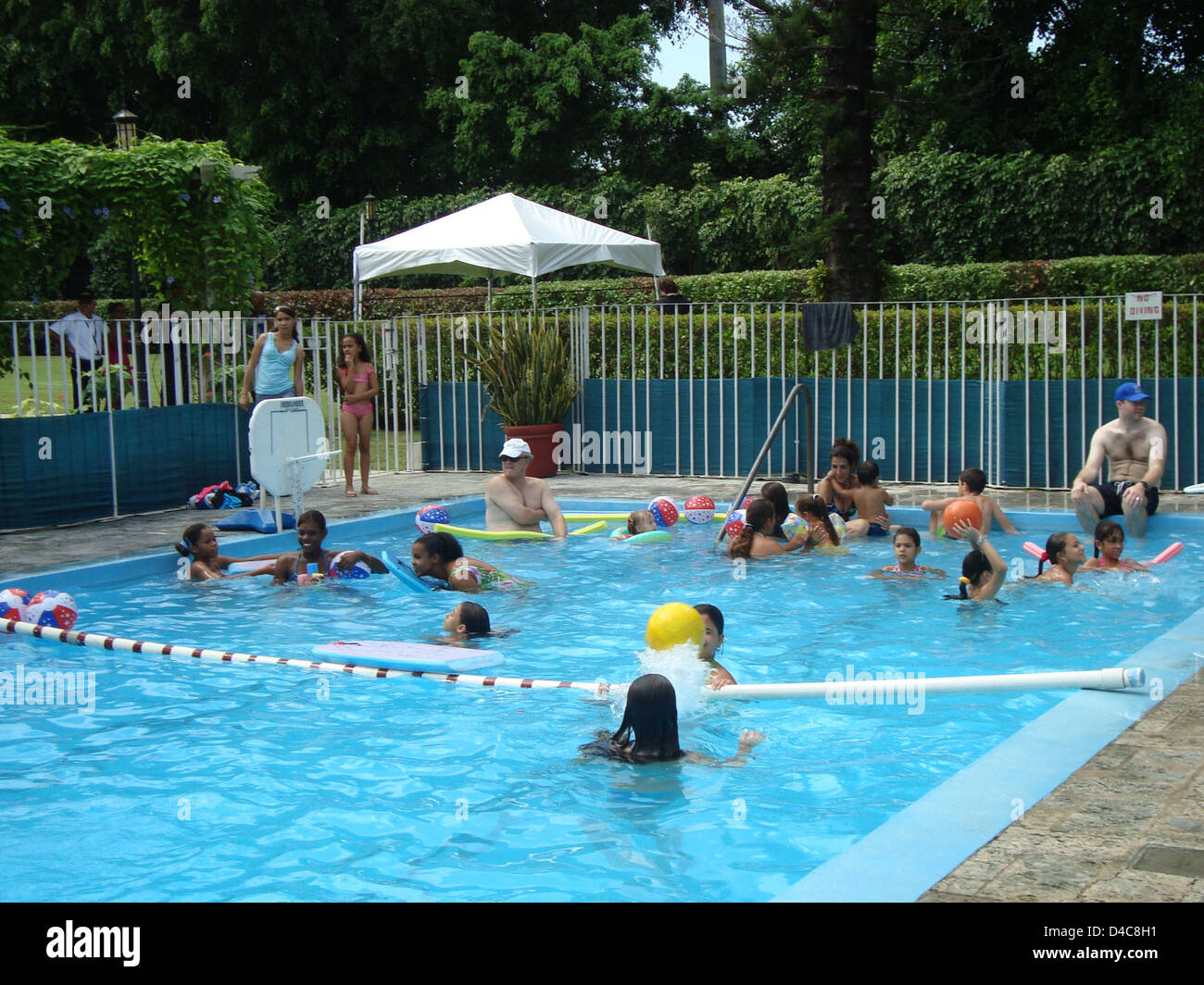 Guests Keep Cool in the Pool Stock Photo - Alamy