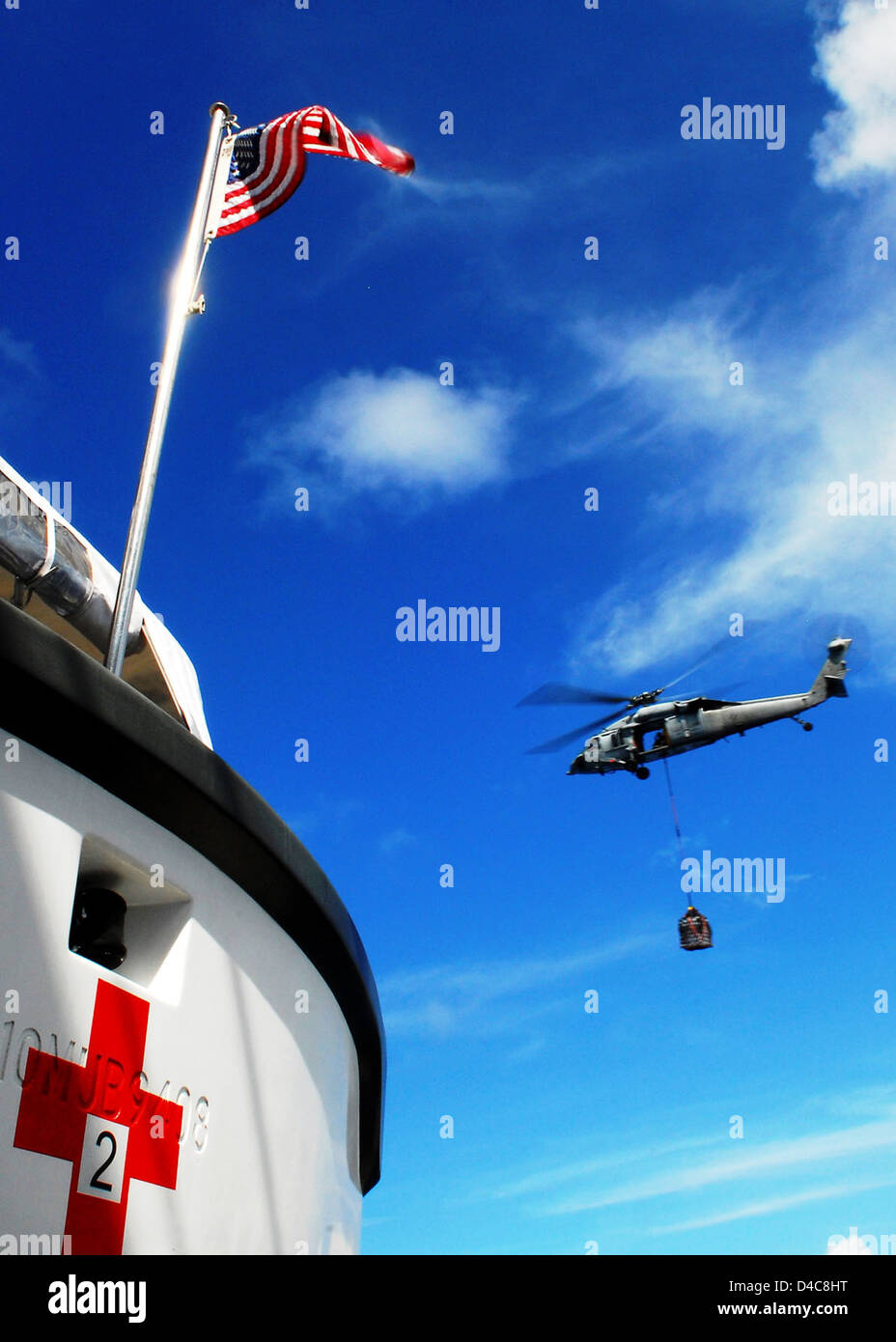 An MH-60S Knighthawk Helicopter Conducts a Vertical Replenishment ...