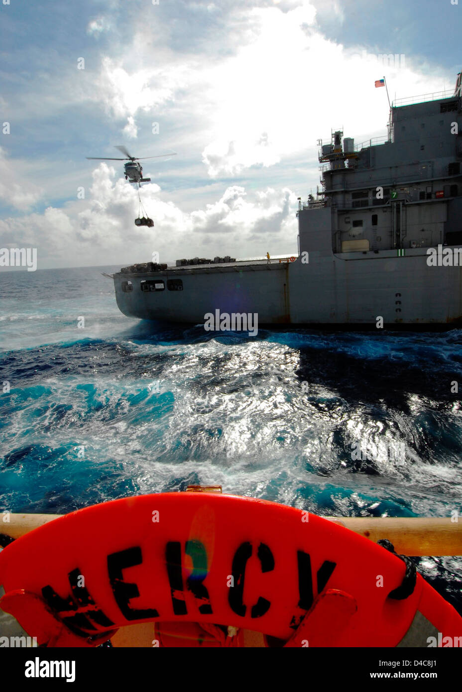 An MH-60S Knighthawk Helicopter Conducts a Vertical Replenishment ...