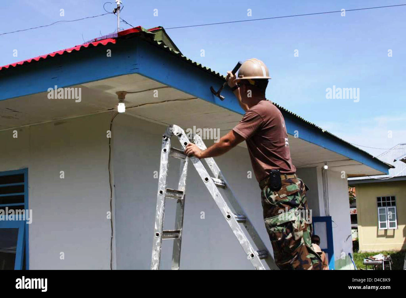 Hospital Corpsman 1st Class Trevor Wolfe Prepares Room Trim for a Final ...