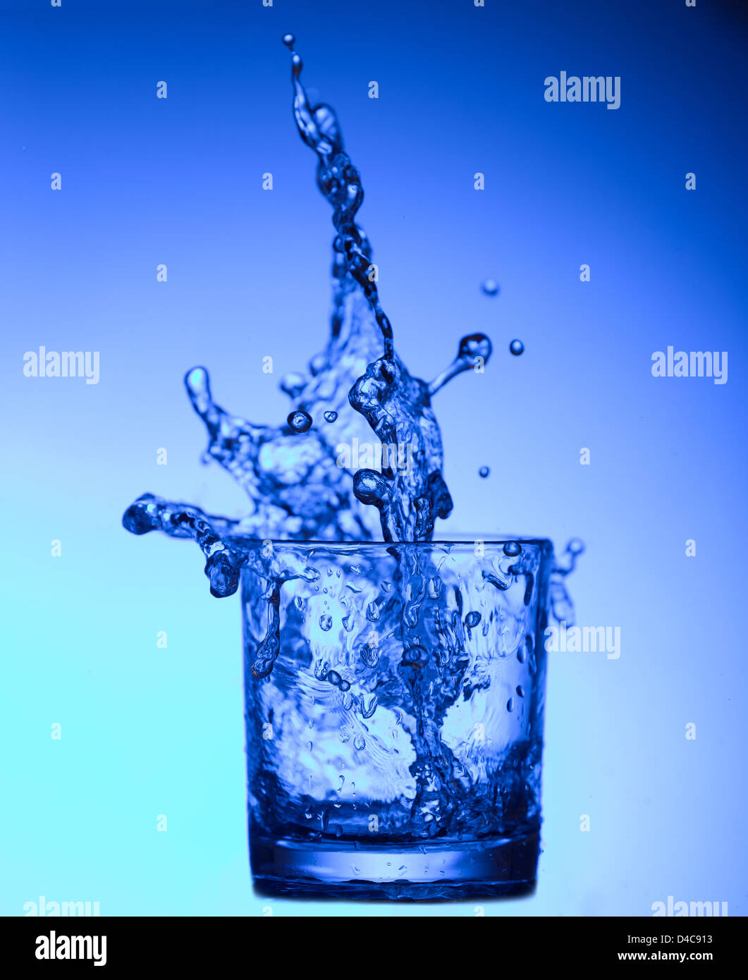 splash of water in a glass Stock Photo - Alamy