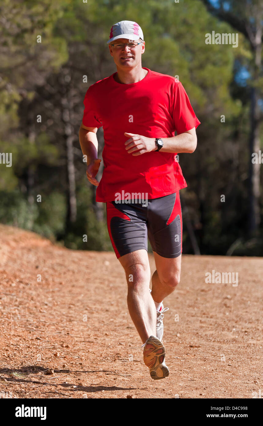 Young runner while training for a competition Stock Photo - Alamy