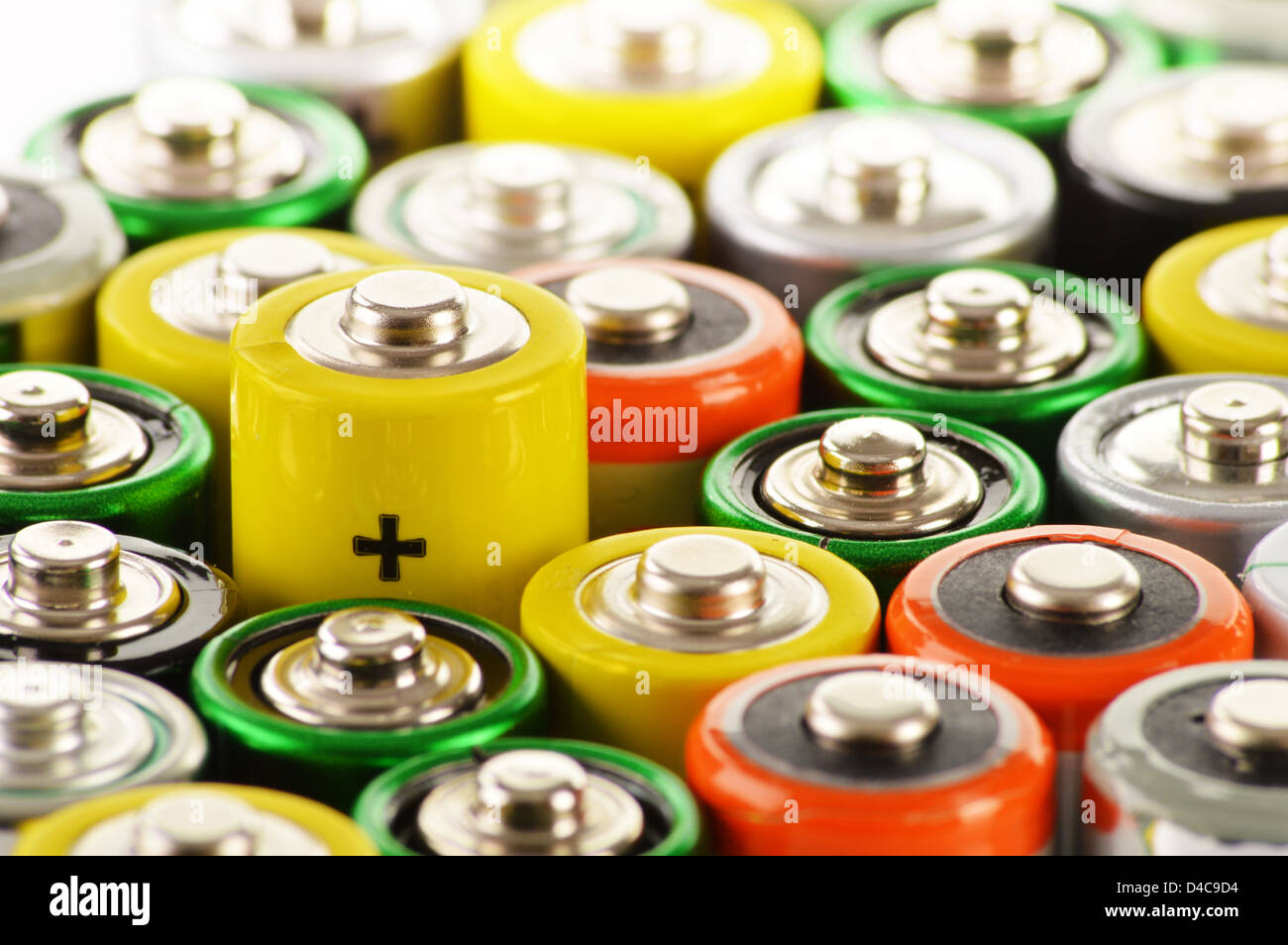 Composition with alkaline batteries Stock Photo - Alamy