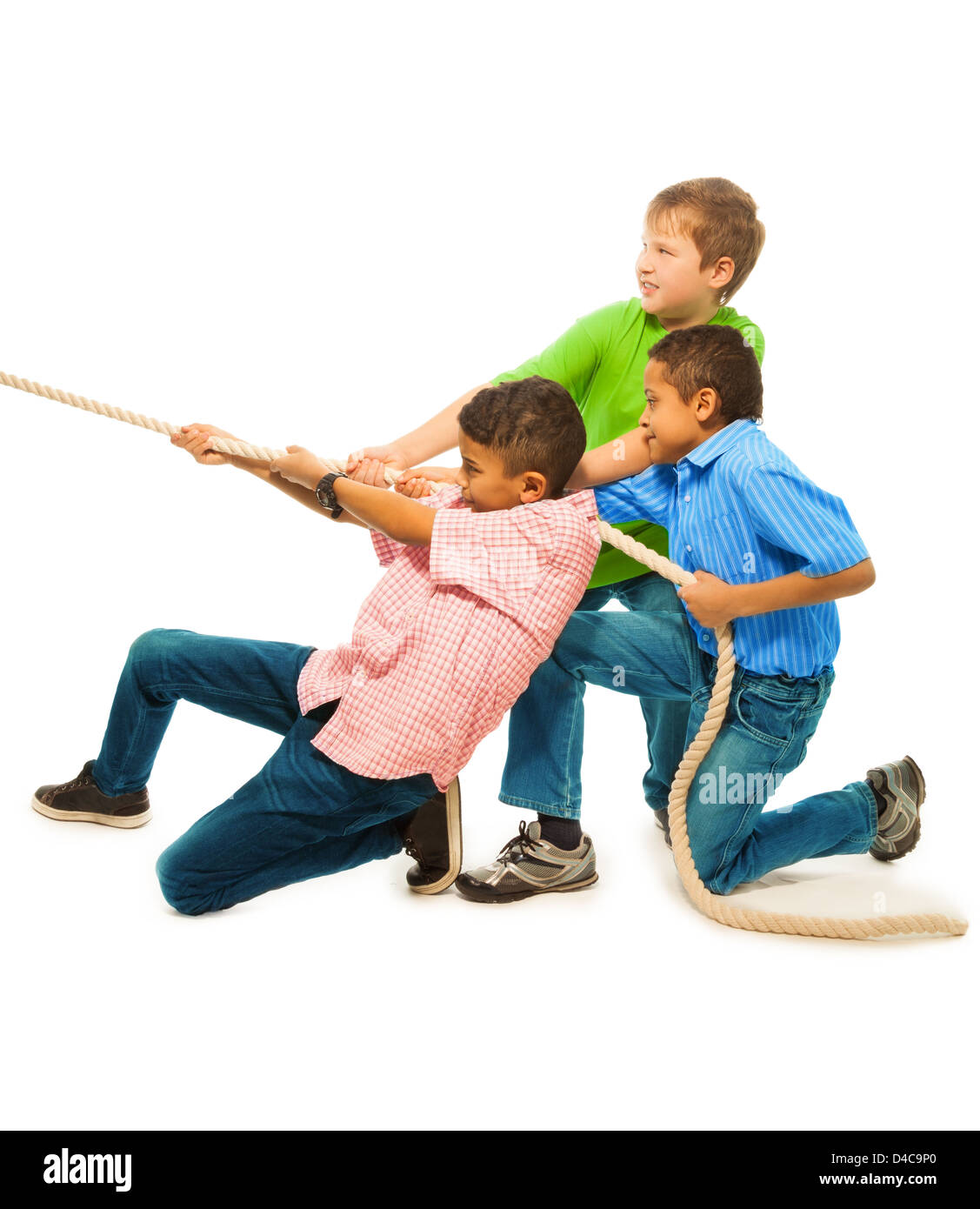 Three strong boys pulling the rope with strength standing isolated on ...