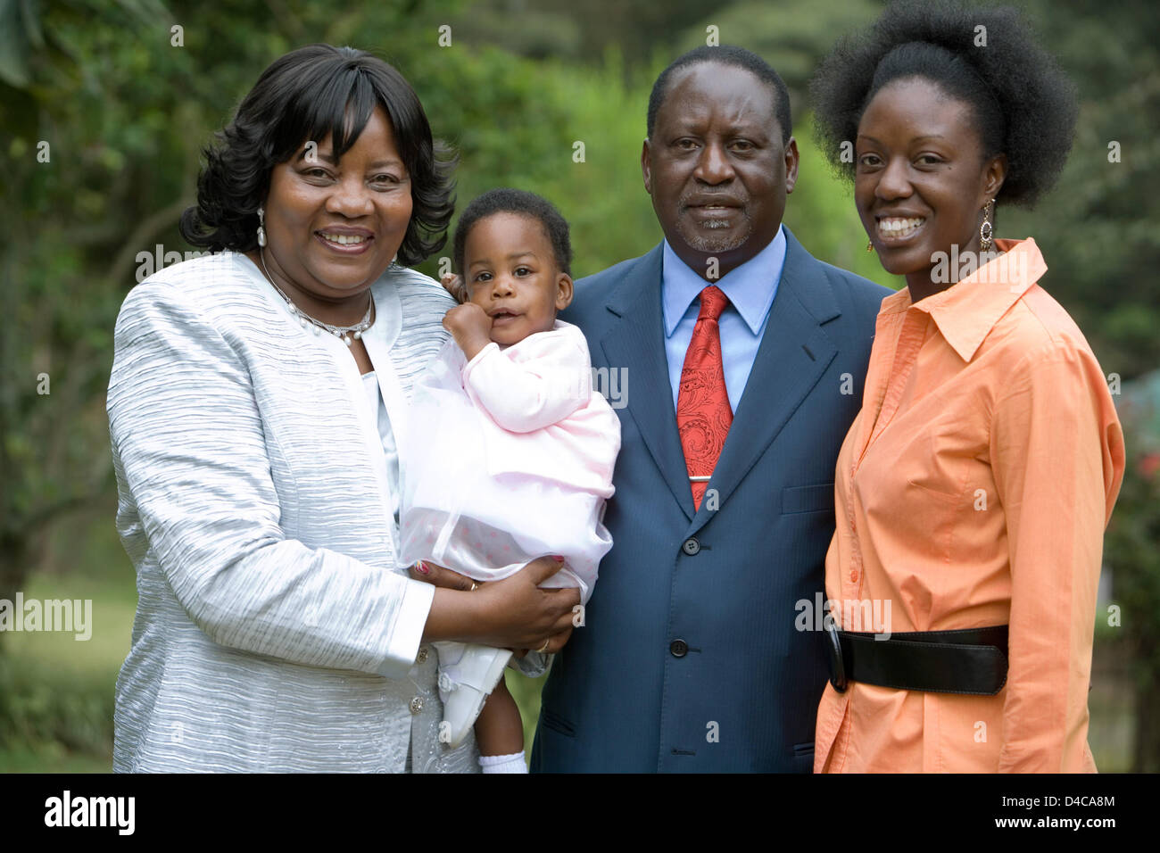 Raila Odinga and his wife Ida Betty Odinga (L) pose with their daughter ...