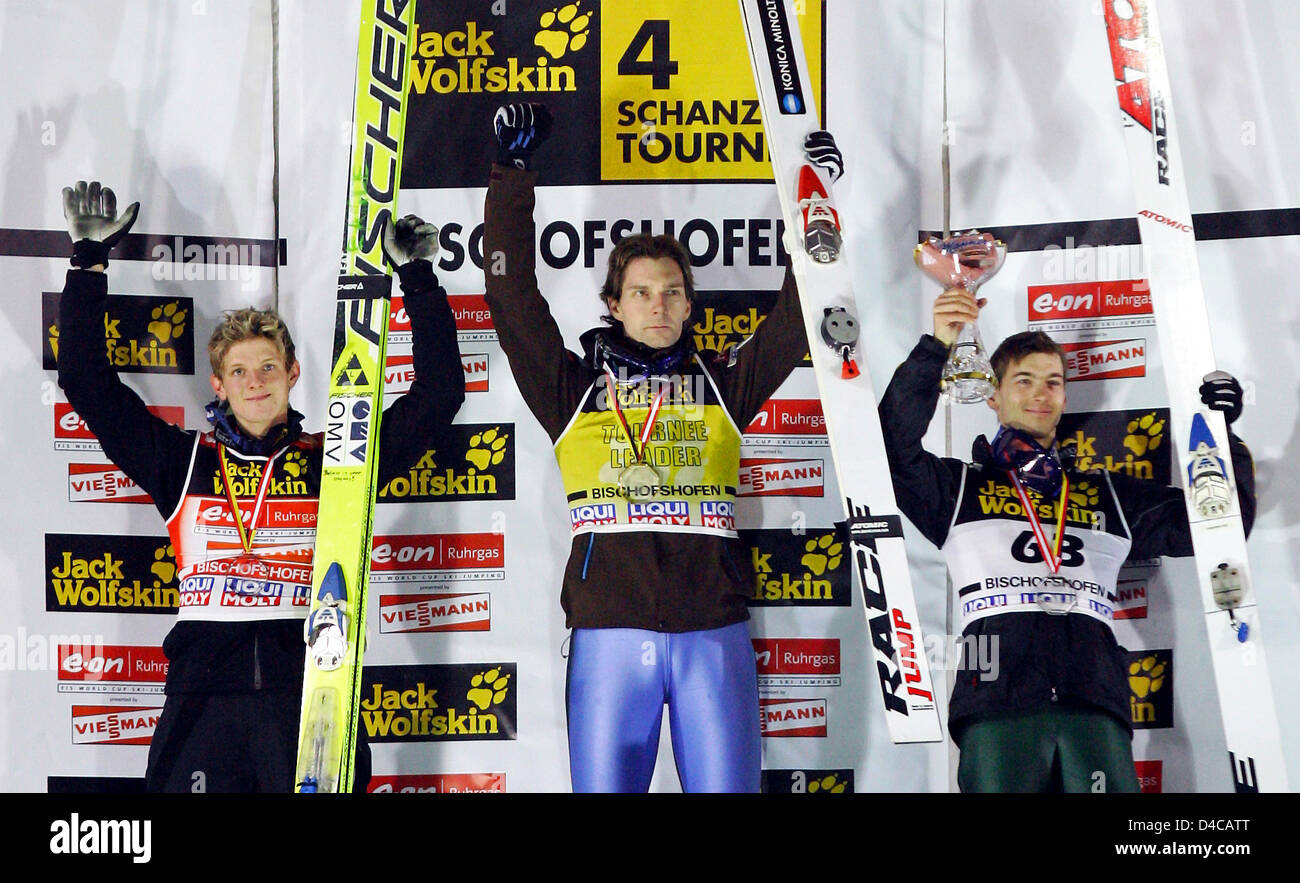 The Finnish overall winner Janne Ahonen (C) cheers on the podium with ...