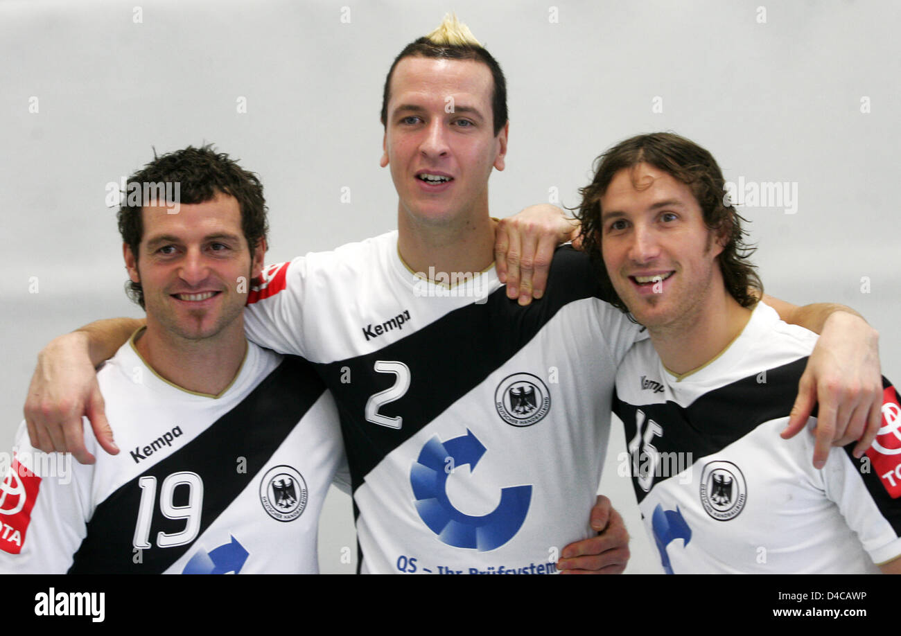 German national handball players Florian Kehrmann (L-R), Pascal Hens ...