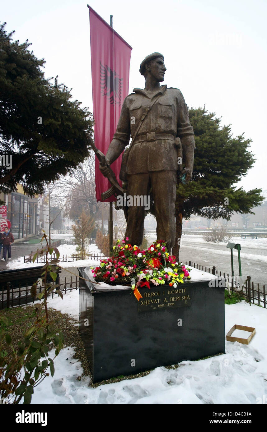 A statue commemorates the KIA of the Kosovo Liberation Army (UCK) in ...