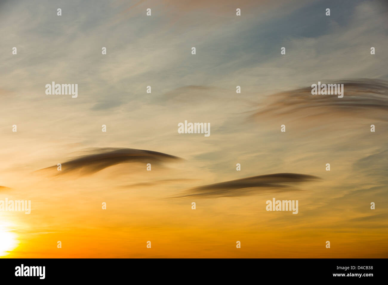 The sun setting over the Irish sea from Hardknott Pass, in the Lake ...