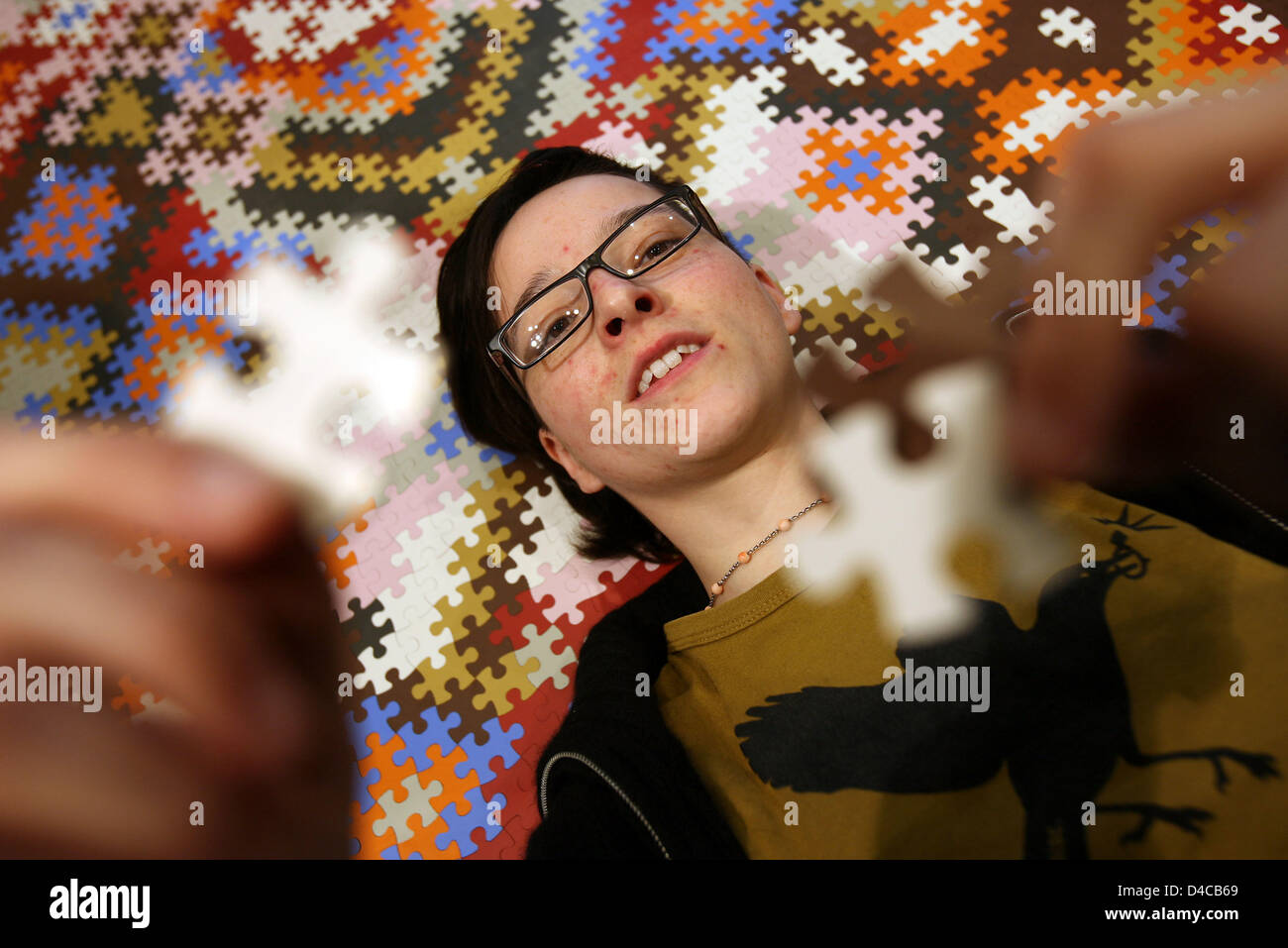 Designer Katrin Sonnleitner sprawls out on her creation, a 'Puzzle ...