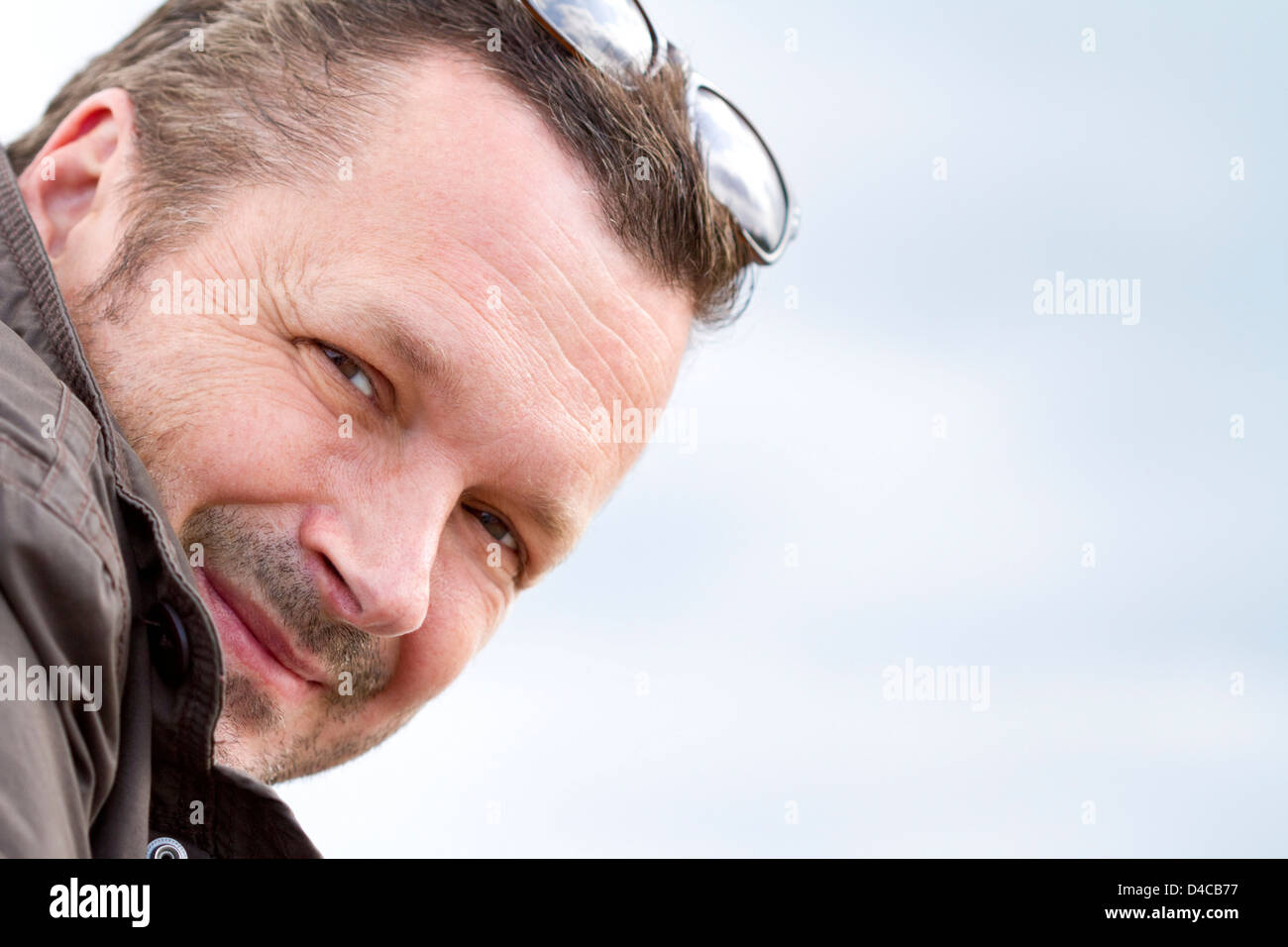 Smiling man outdoors, portrait Stock Photo - Alamy