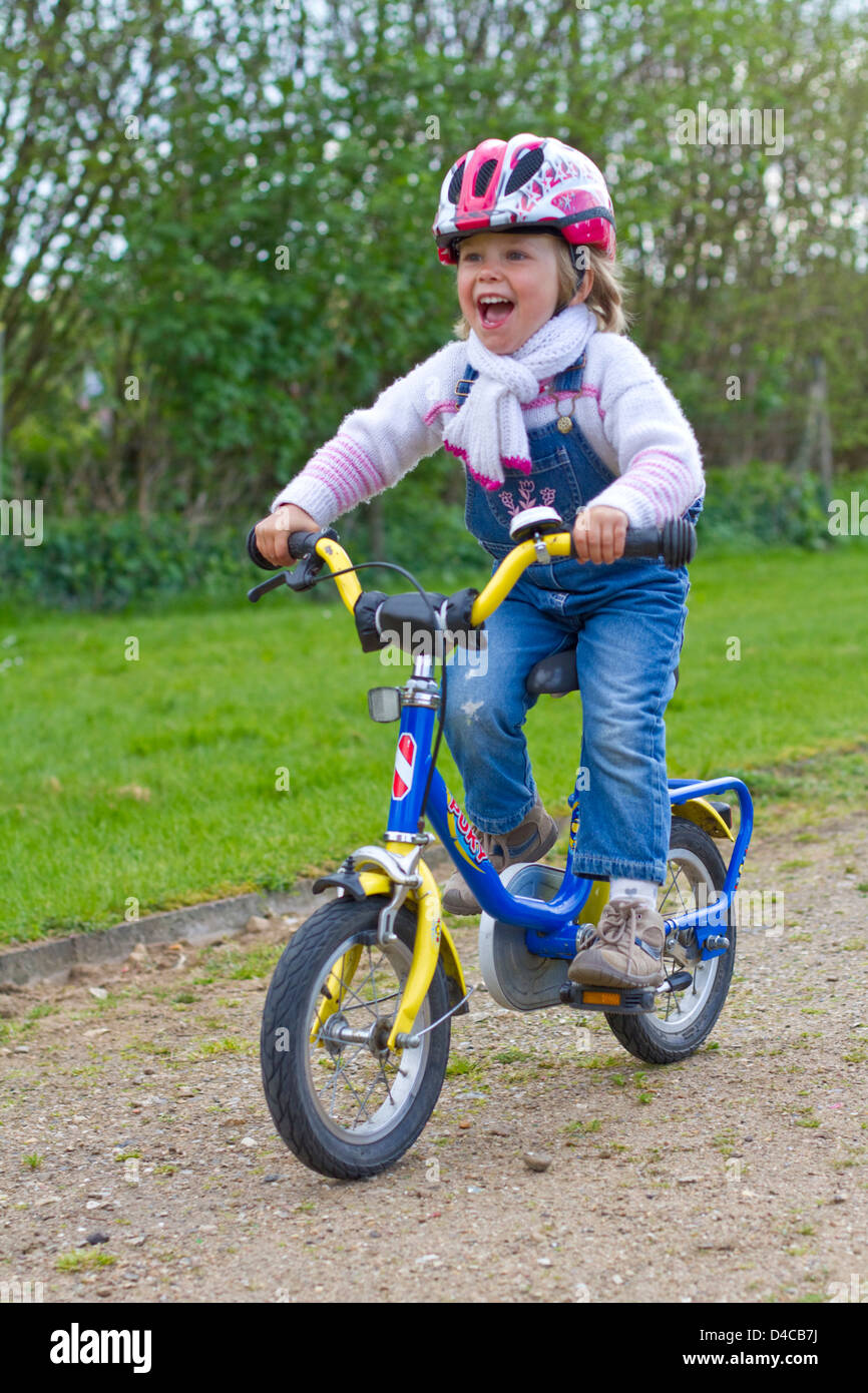 Toddler on a bike Stock Photo - Alamy