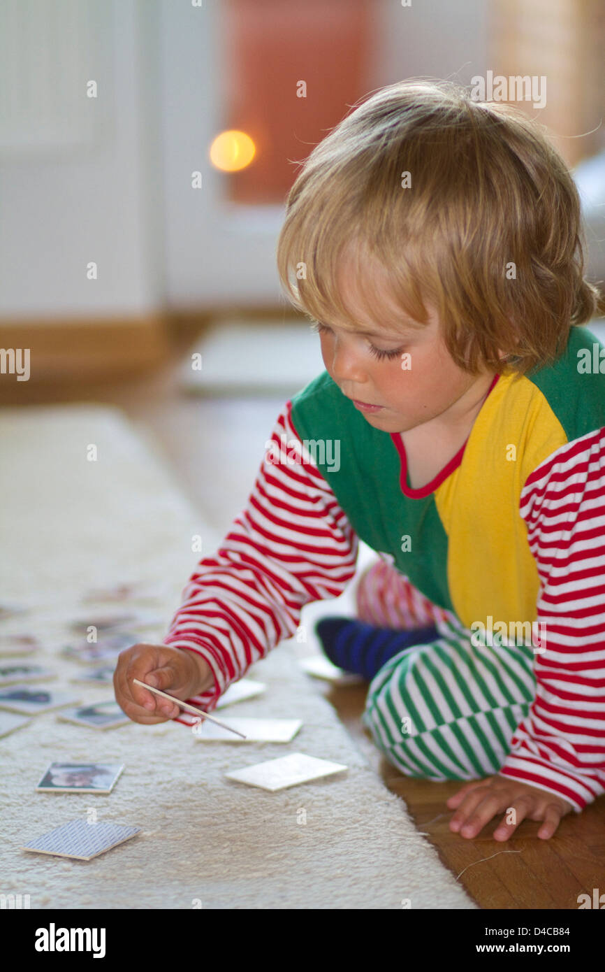 Child play cards hi-res stock photography and images - Alamy