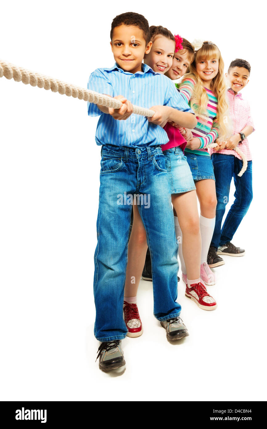 Group of five diversity looking kids pulling the rope together standing ...