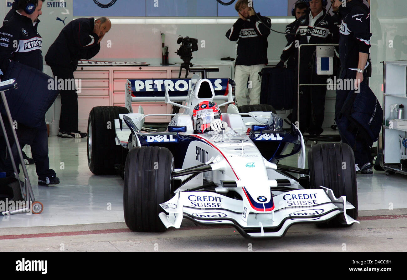 Polish Formula One driver Robert Kubica of BMW Sauber steers the new ...