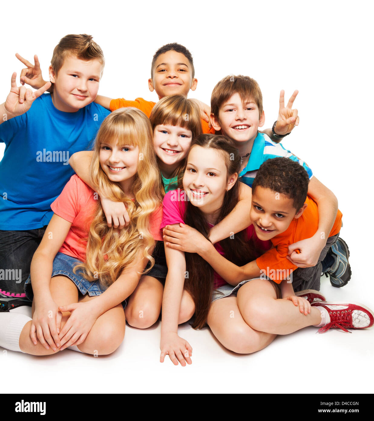 Group of happy smiling kids sitting together and playing - boys and ...