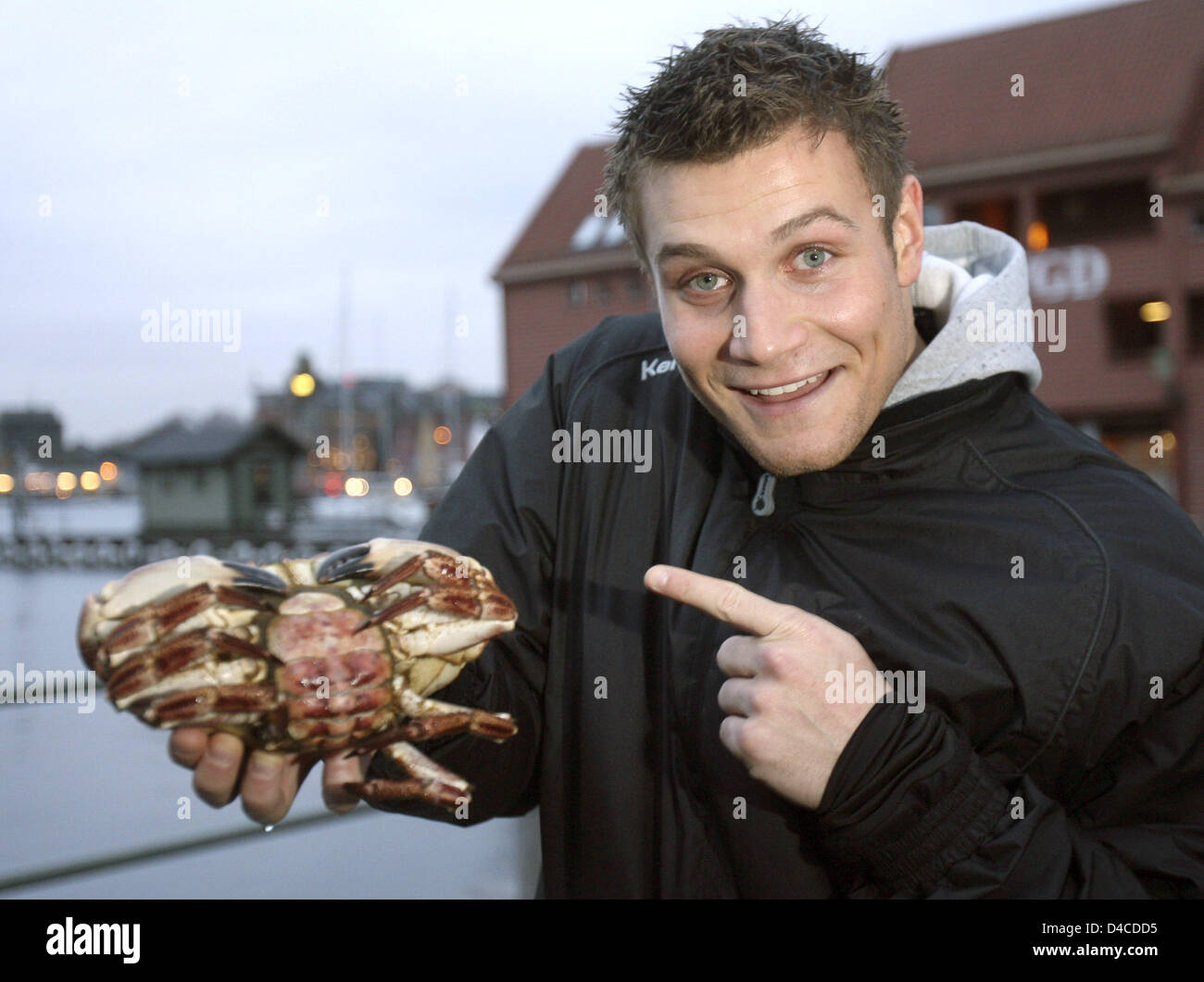 German national handball team player Michael Kraus poses with a large ...