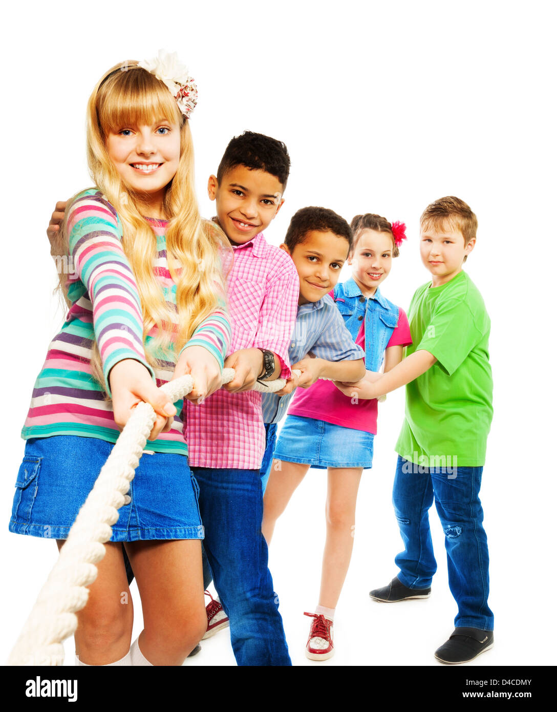 Pulling the rope game with 5 kids Stock Photo - Alamy