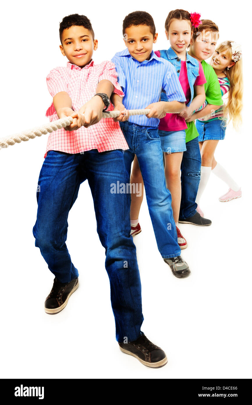 5 kids having fun pulling the rope Stock Photo - Alamy