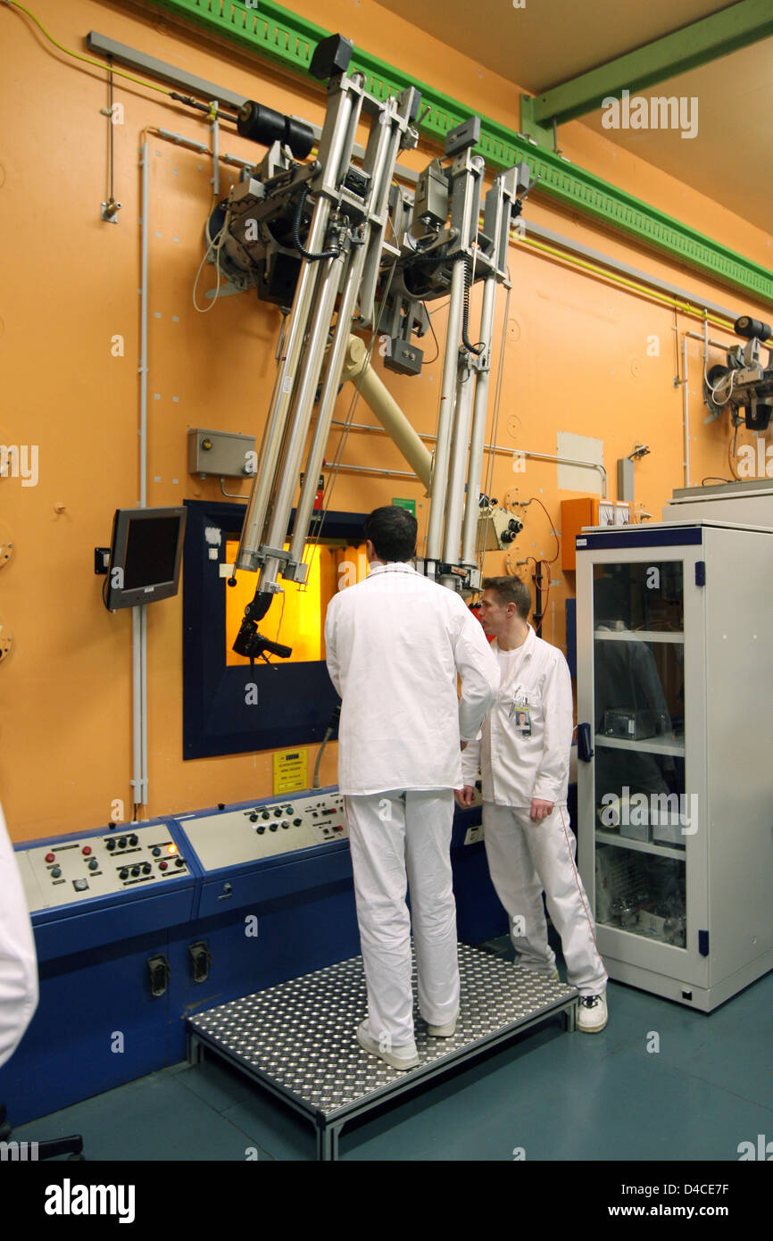 Scientists operate a room with so-called 'hot cells' to analyse nuclear ...