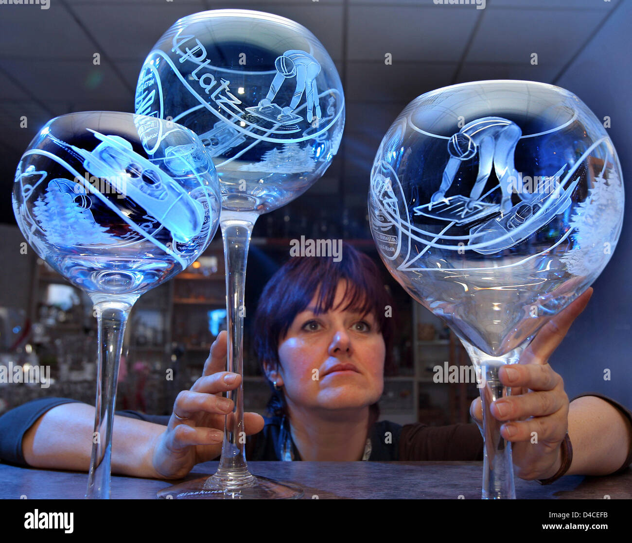 Marion Fischer, master of glass refinement, checks the trophies for the ...