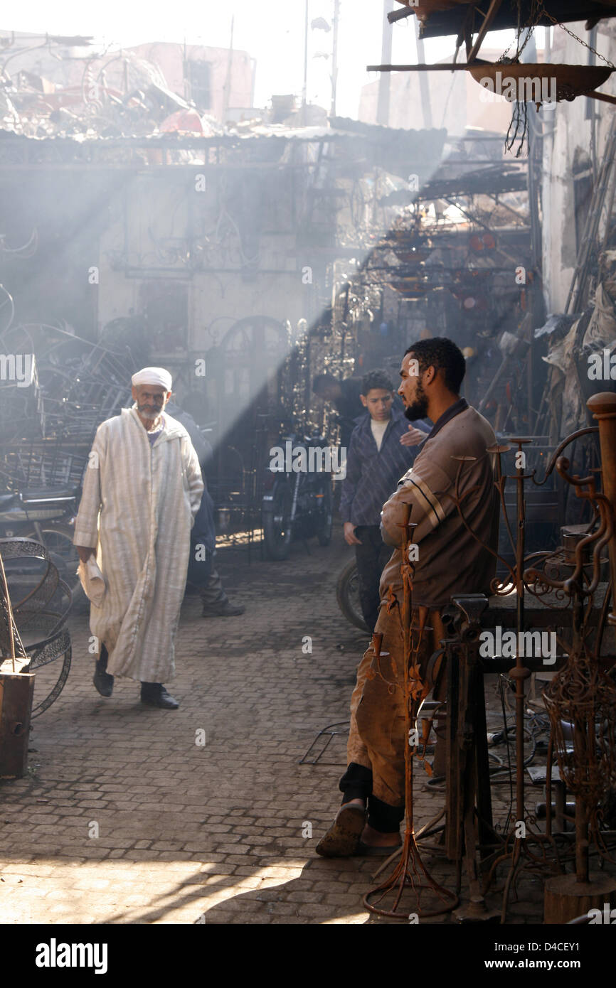 The sun shines through the semi open roof of Marrakech's souk ...