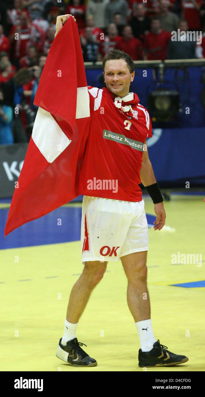 Denmark's Lars Christiansen celebrates after the victory in the final ...