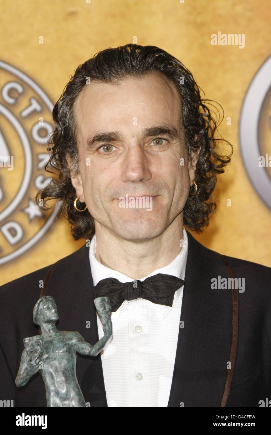 Daniel Day-Lewis, winner of the Best Actor Award, poses at the 14th ...
