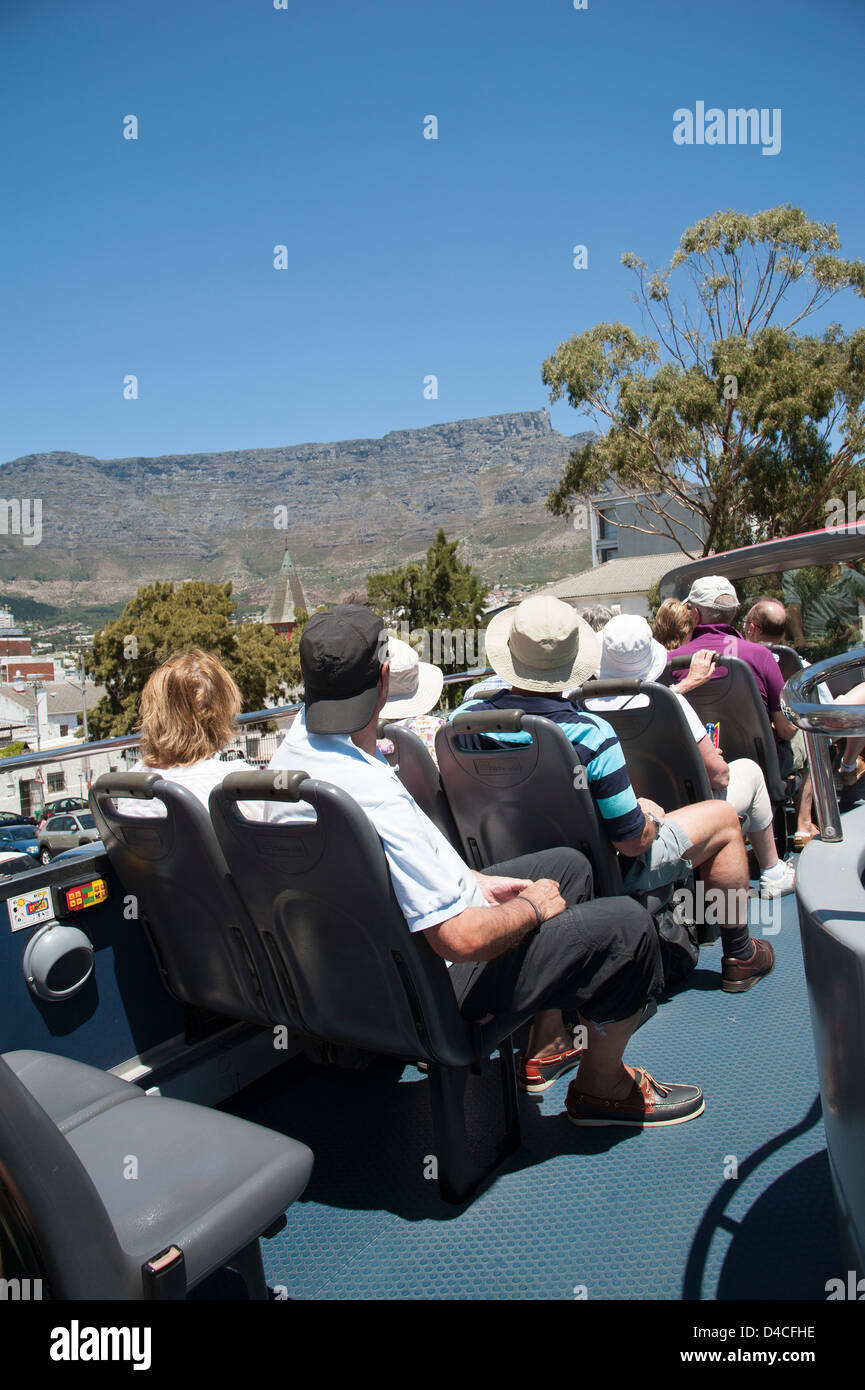 Table Mountain Cape Town South Africa. Tourists aboard an open deck bus ...