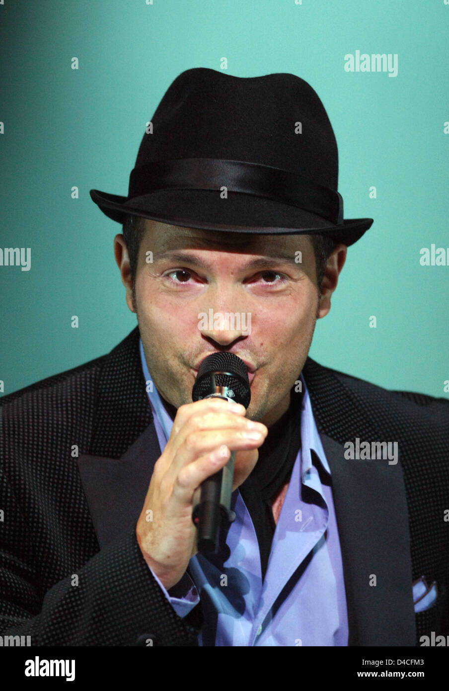 German jazz singer Roger Cicero performs to the sold-out venue in ...