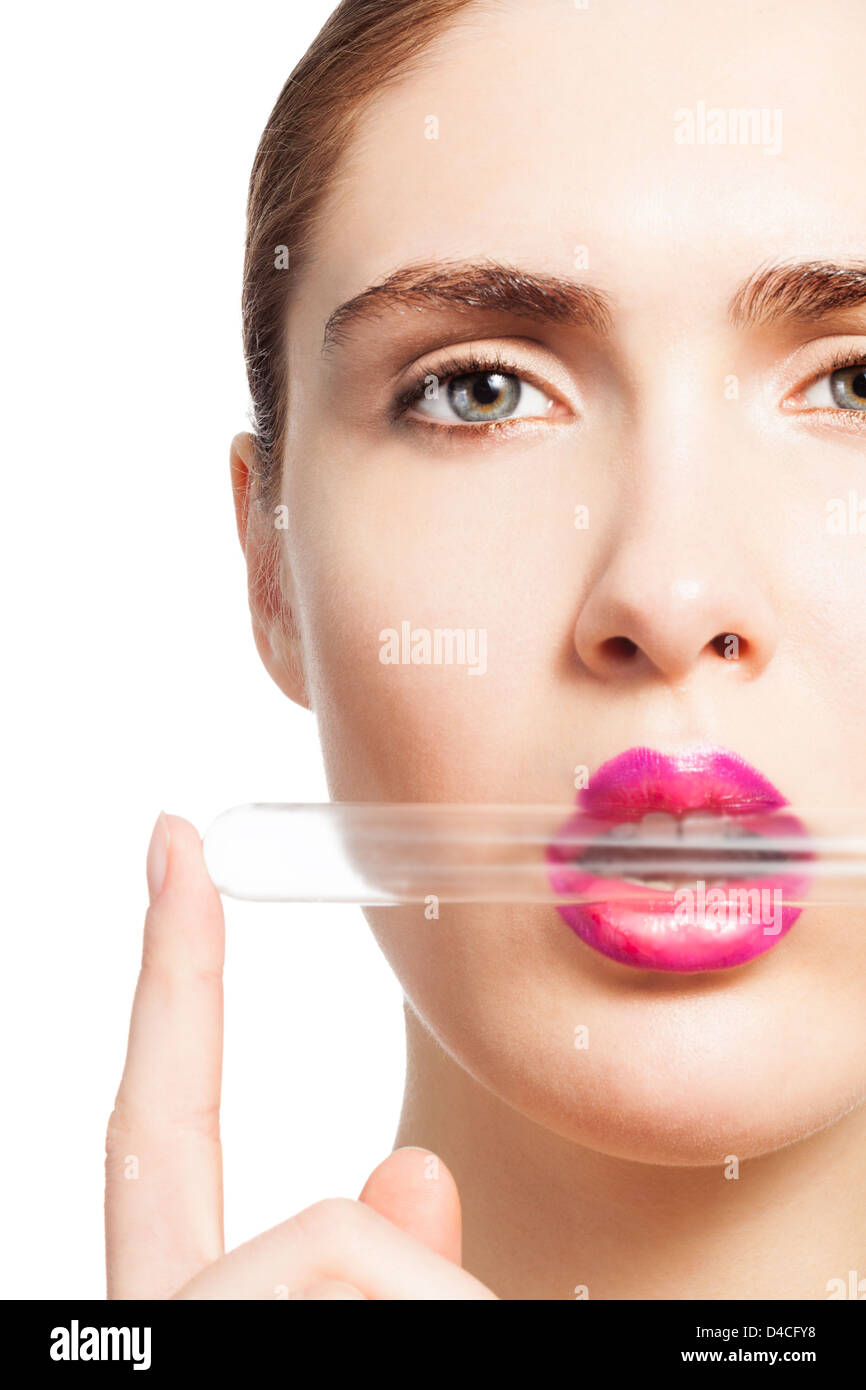 Beauty closeup portrait of woman holding laboratory test tube in her ...
