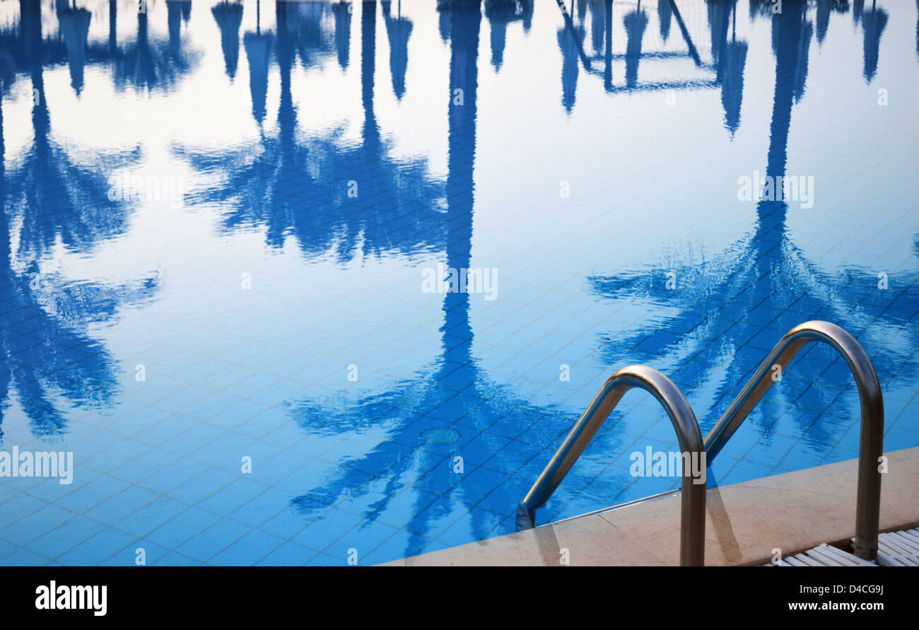Swimming pool during summer time Stock Photo - Alamy