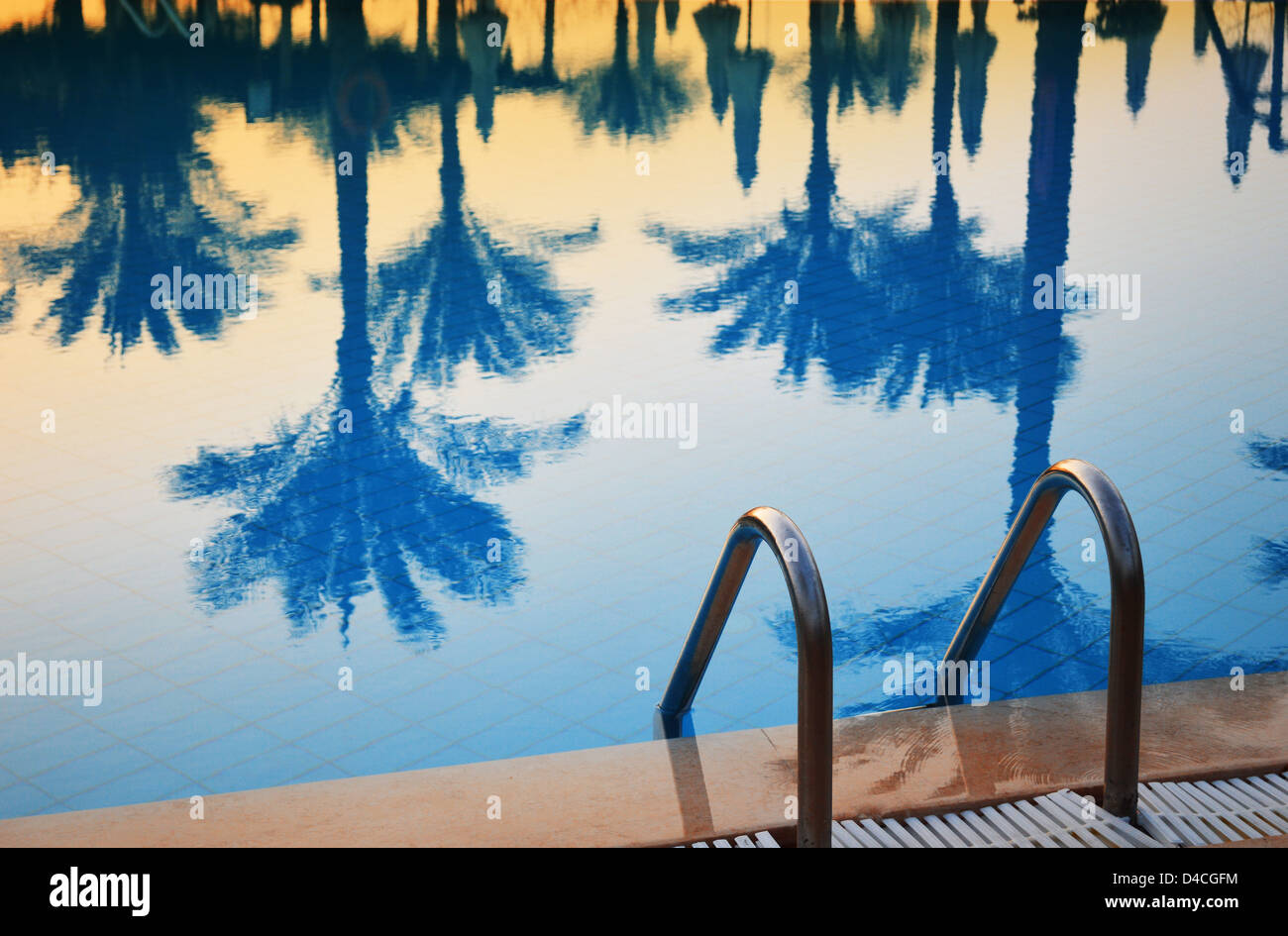 Swimming pool during summer time Stock Photo - Alamy