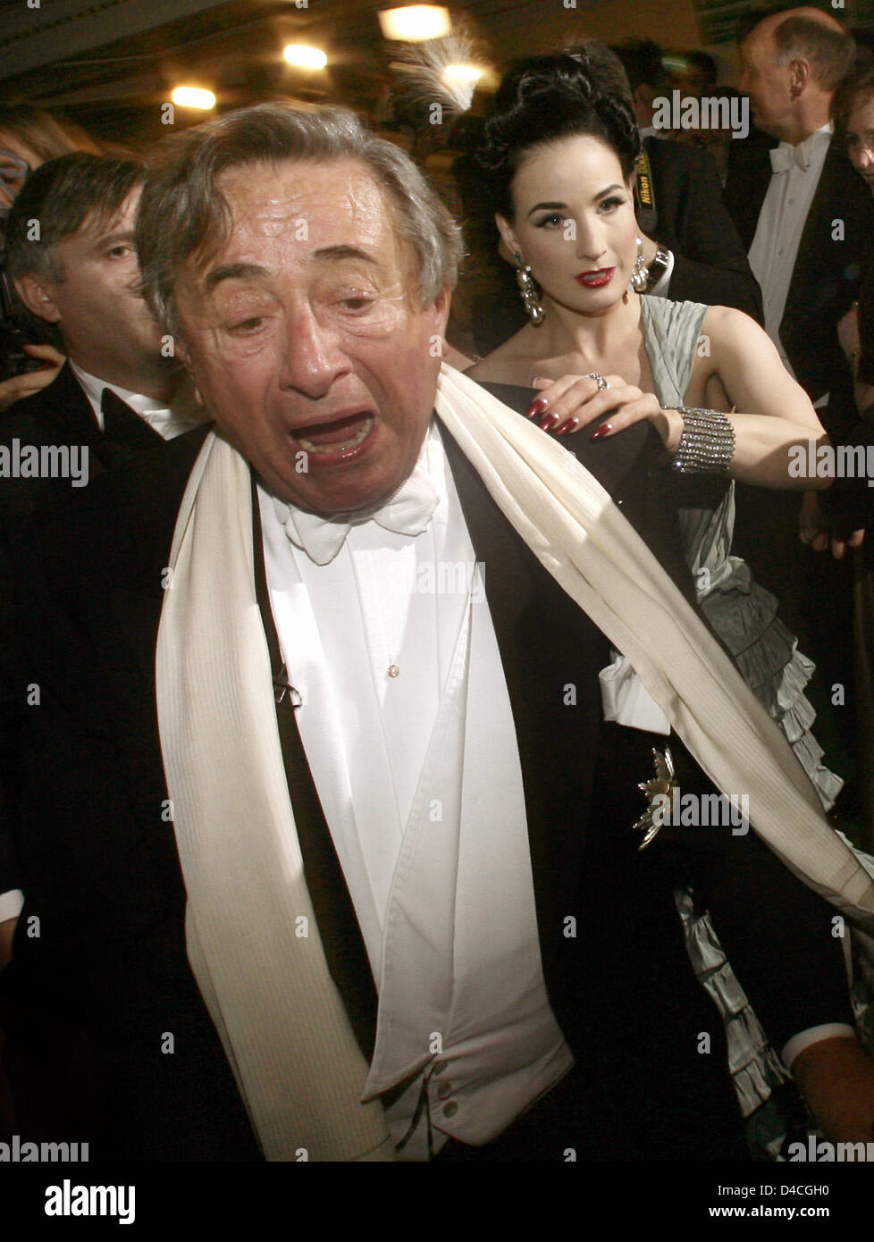 Construction mogul Richard Lugner (L) leads US actress and model Dita ...