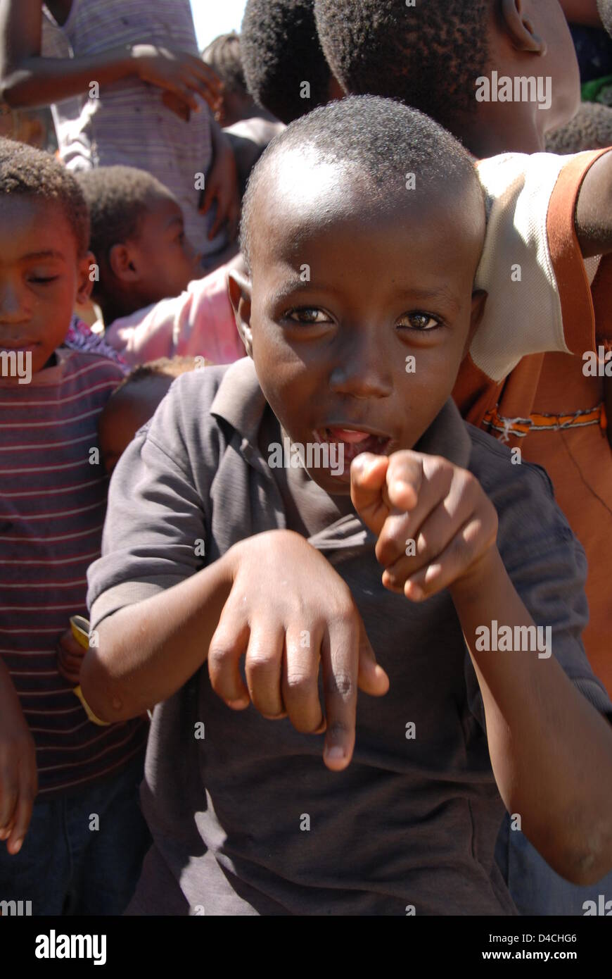 A boy poses for the camera during an informative event within the scope ...